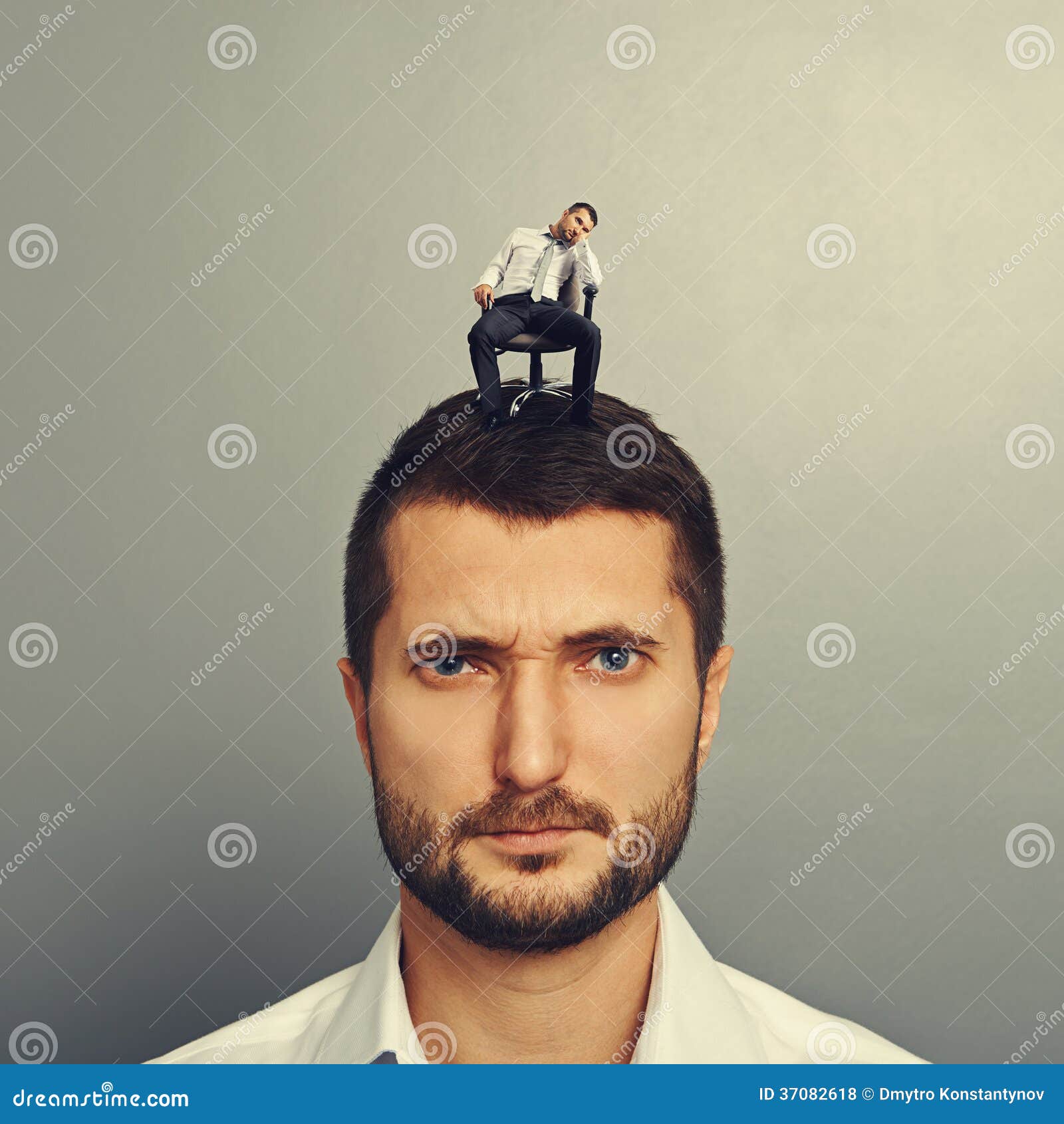 Bored Man Sitting on the Big Head Stock Photo - Image of small, mood ...