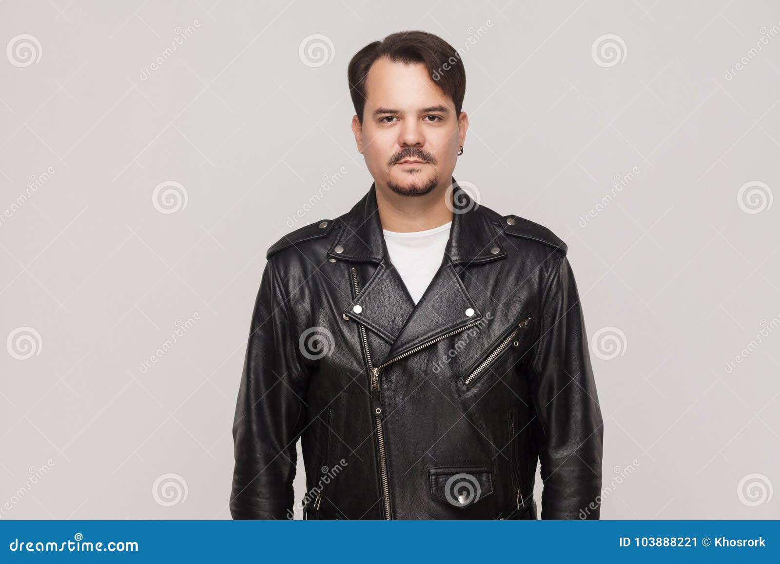 Bored Man Standing Near Gray Wall and Looking at Camera. Stock Image ...