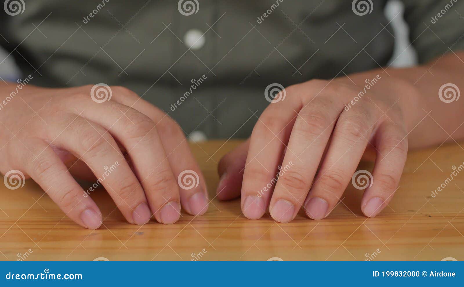 A Bored Man Tapping His Fingers on the Table. Hand of a Man Knocking on ...