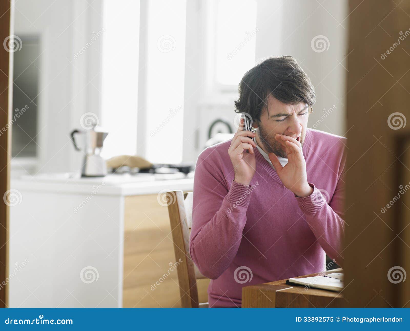 Bored Man Using Cell Phone stock image. Image of adult - 33892575