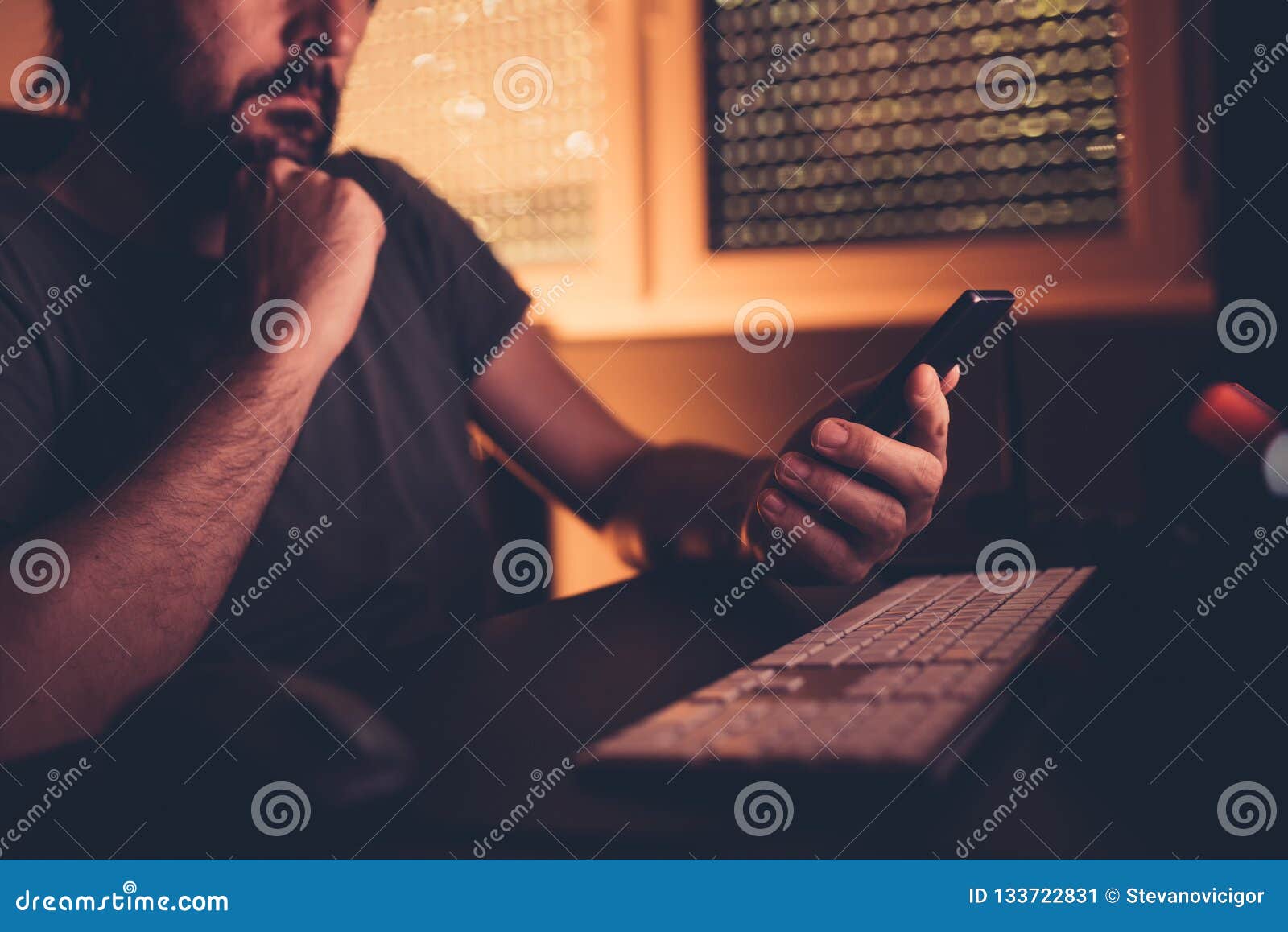 Bored Man Wasting Time Using Mobile Phone Stock Image - Image of ...