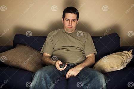 Bored, Overweight Man Sits on the Sofa Stock Image - Image of interior ...