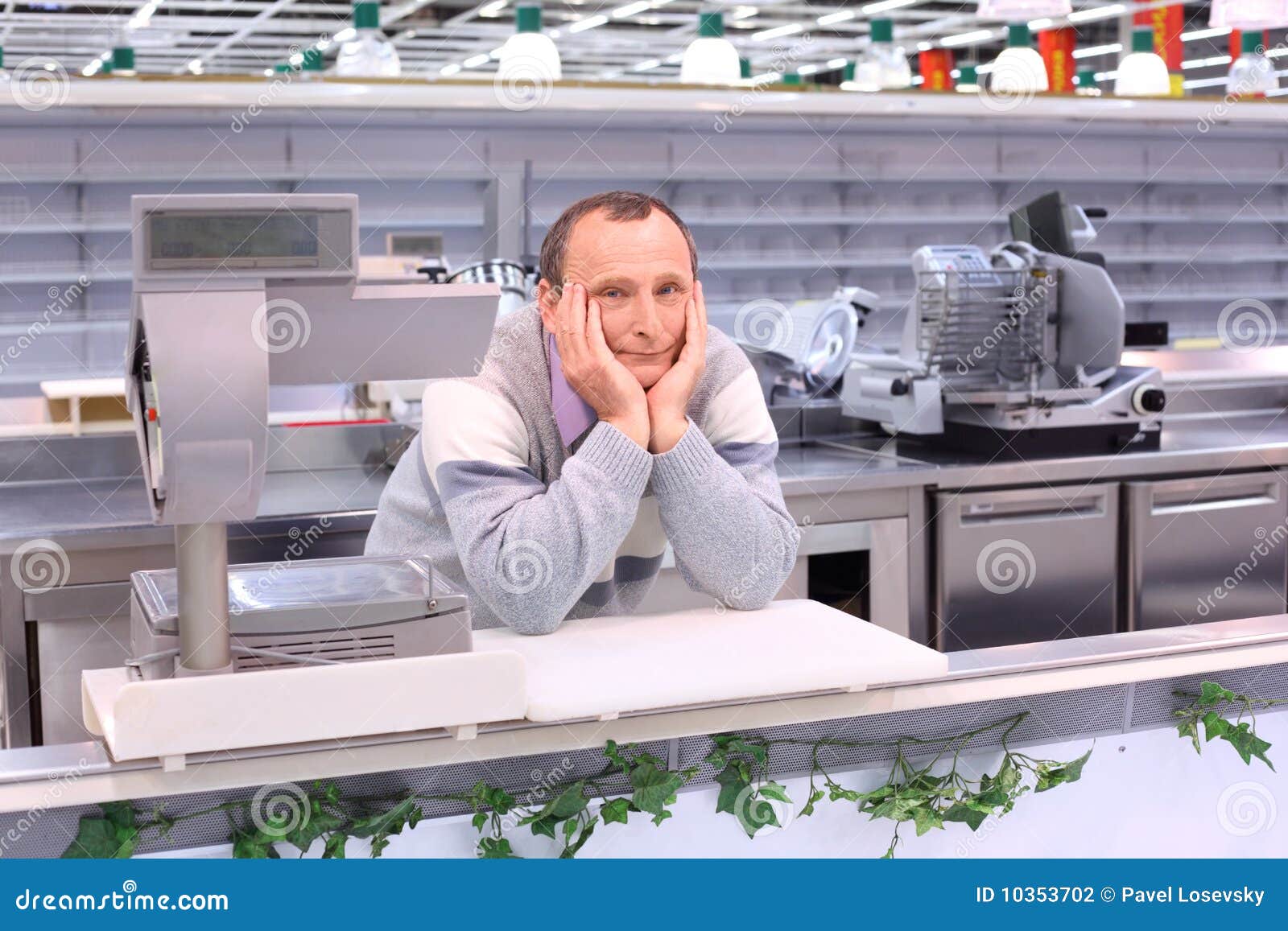 Bored seller in shop stock photo. Image of commercial - 10353702
