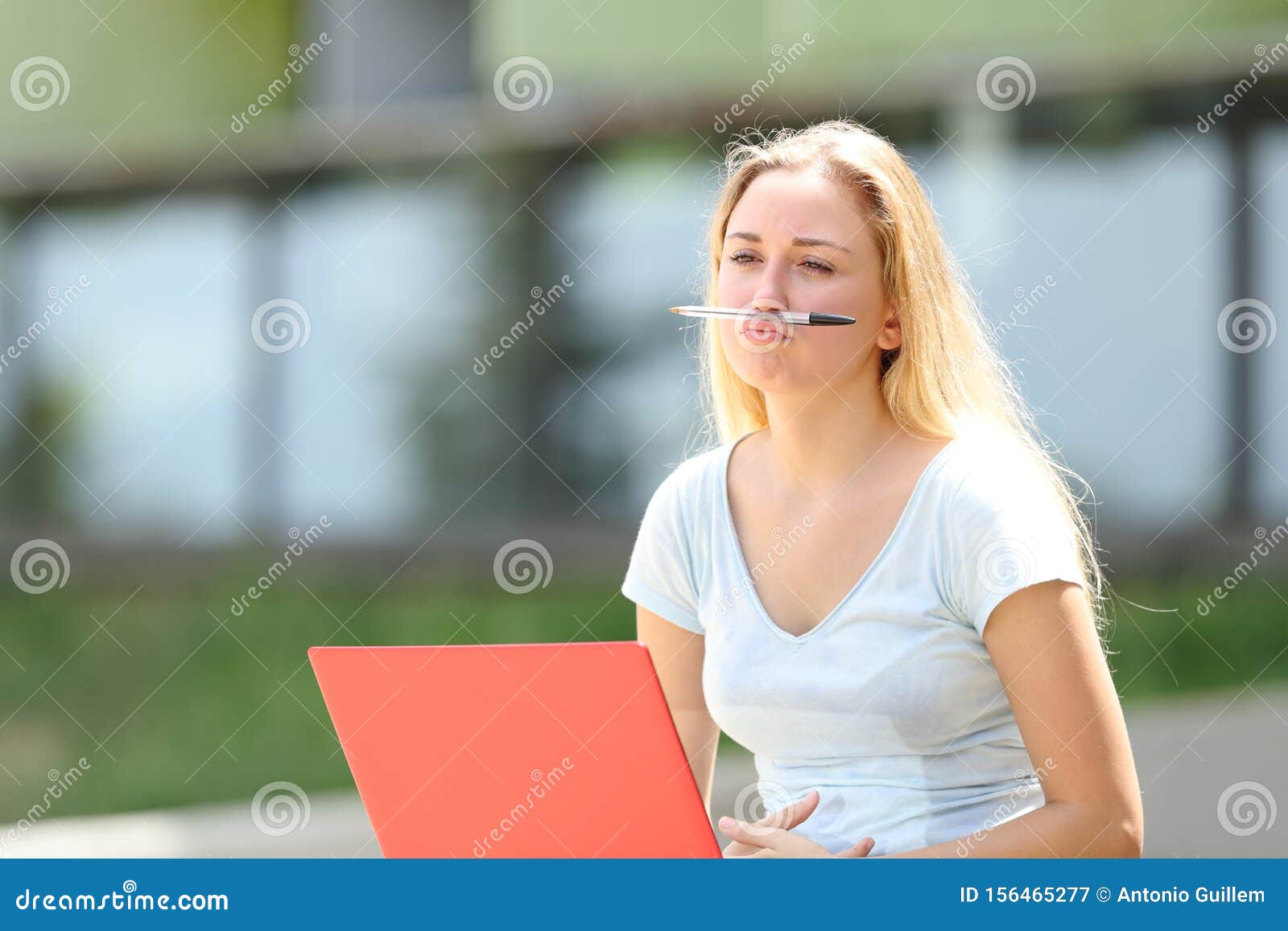 Bored Student Distracted Playing with a Pen Stock Image - Image of ...