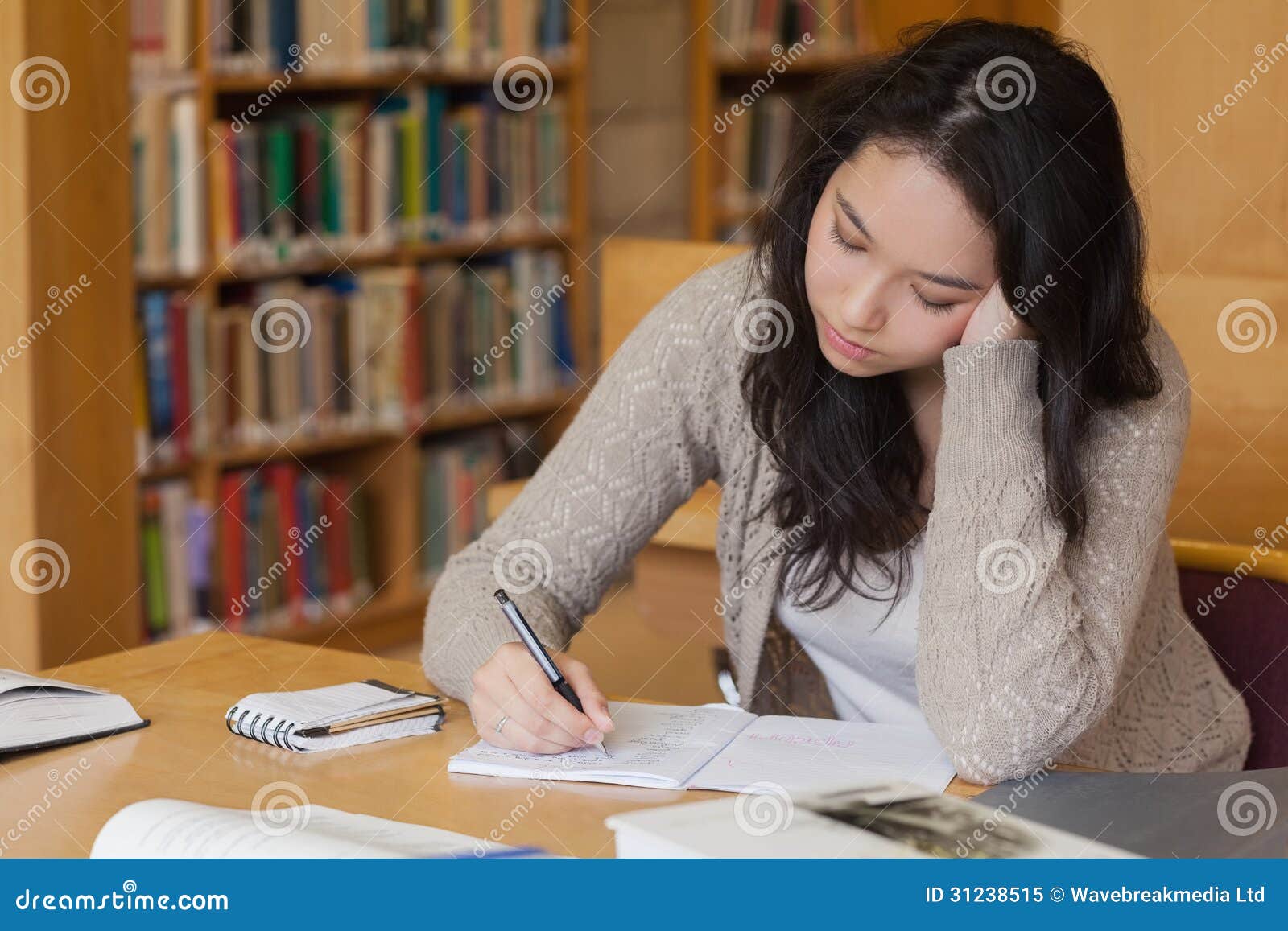 Bored Student in a Library Learning Stock Image - Image of books ...