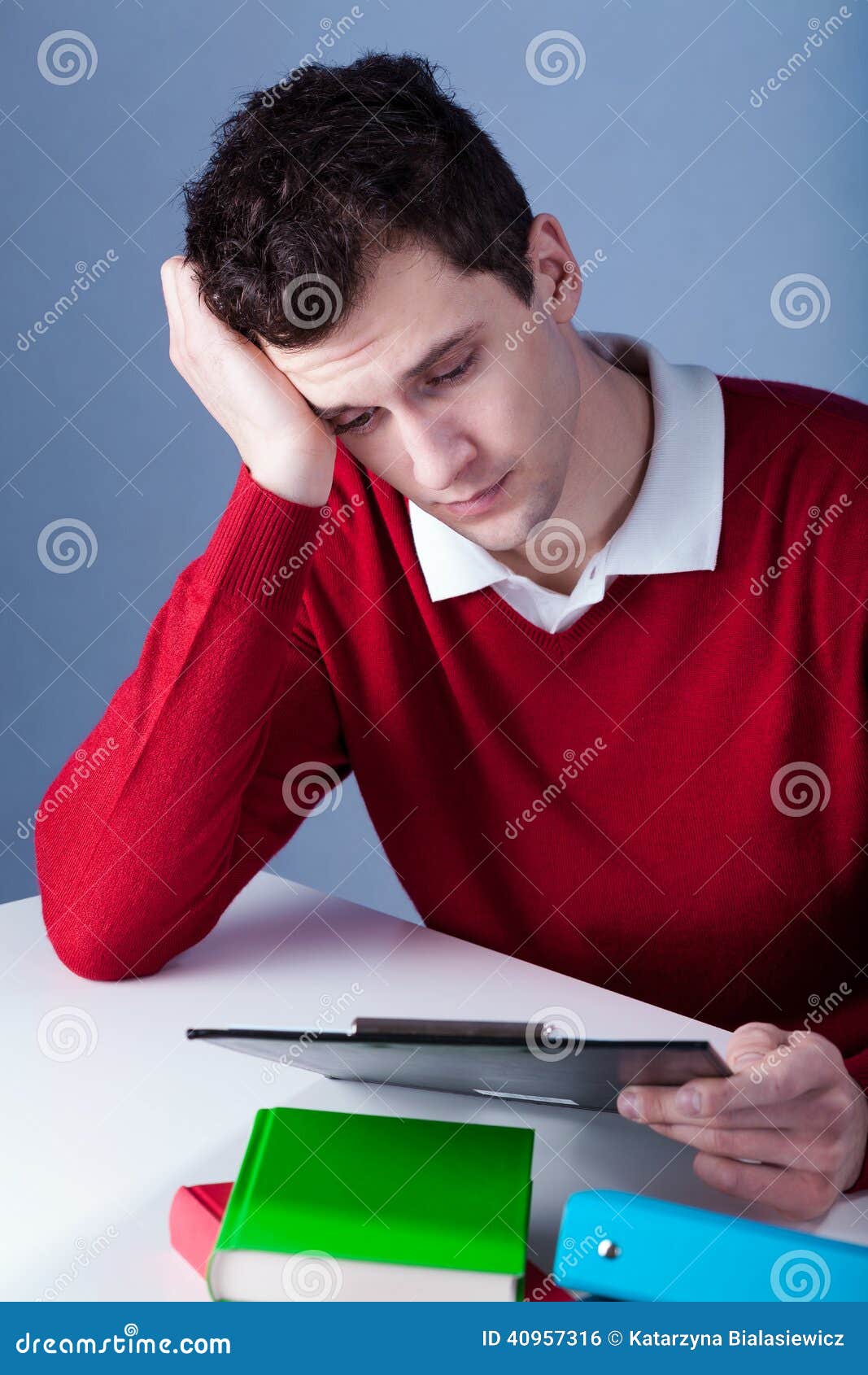 Bored student studying stock photo. Image of files, books - 40957316