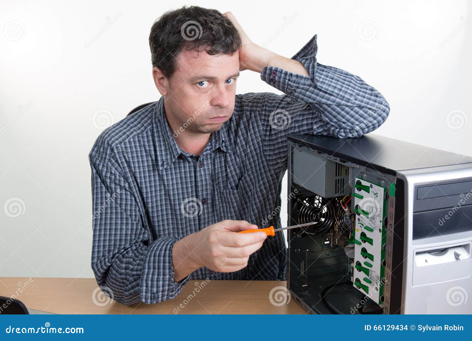 Bored Technician in Front of His Computer Stock Photo - Image of ...