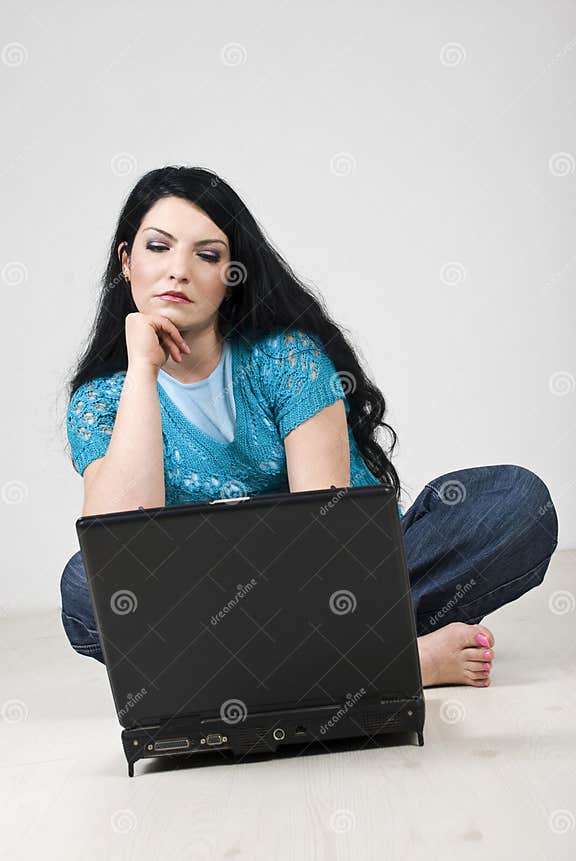 Bored Woman Browsing on a Laptop Stock Image - Image of face, female ...