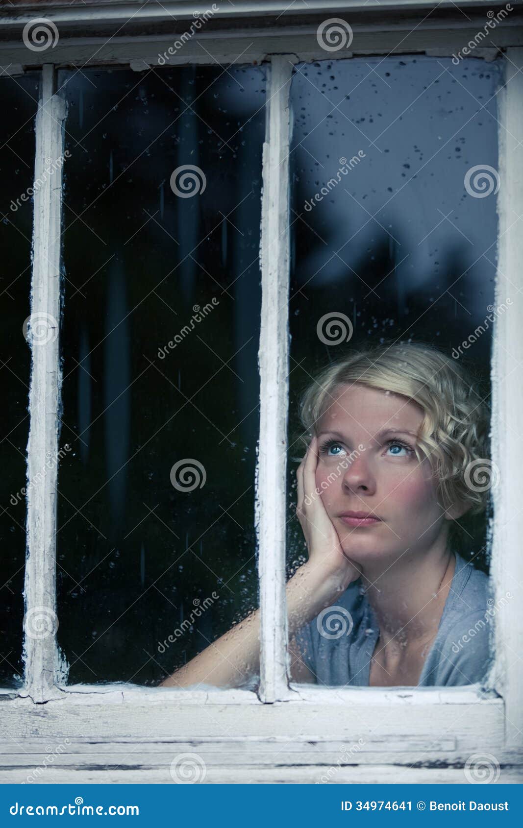 Bored Woman Looking at the Rainy Weather by the Window Stock Image ...