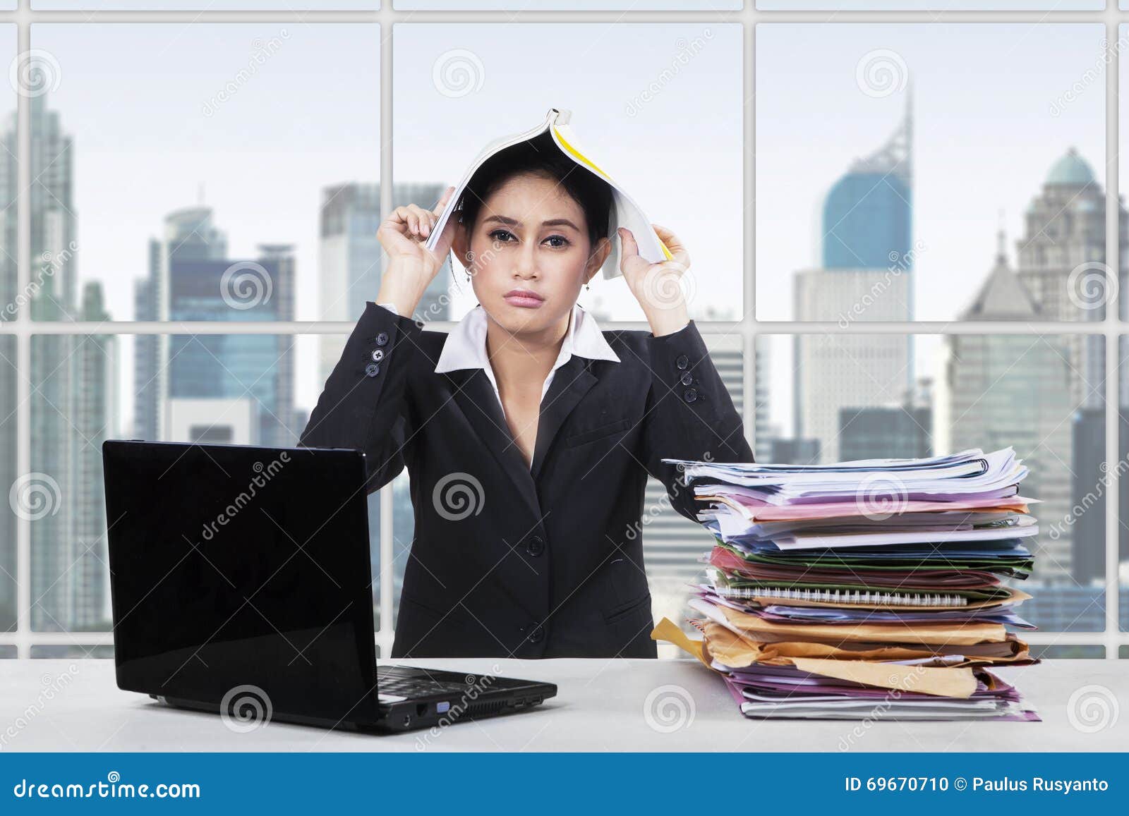 Bored Worker Puts Paperwork on Her Head Stock Photo - Image of ...