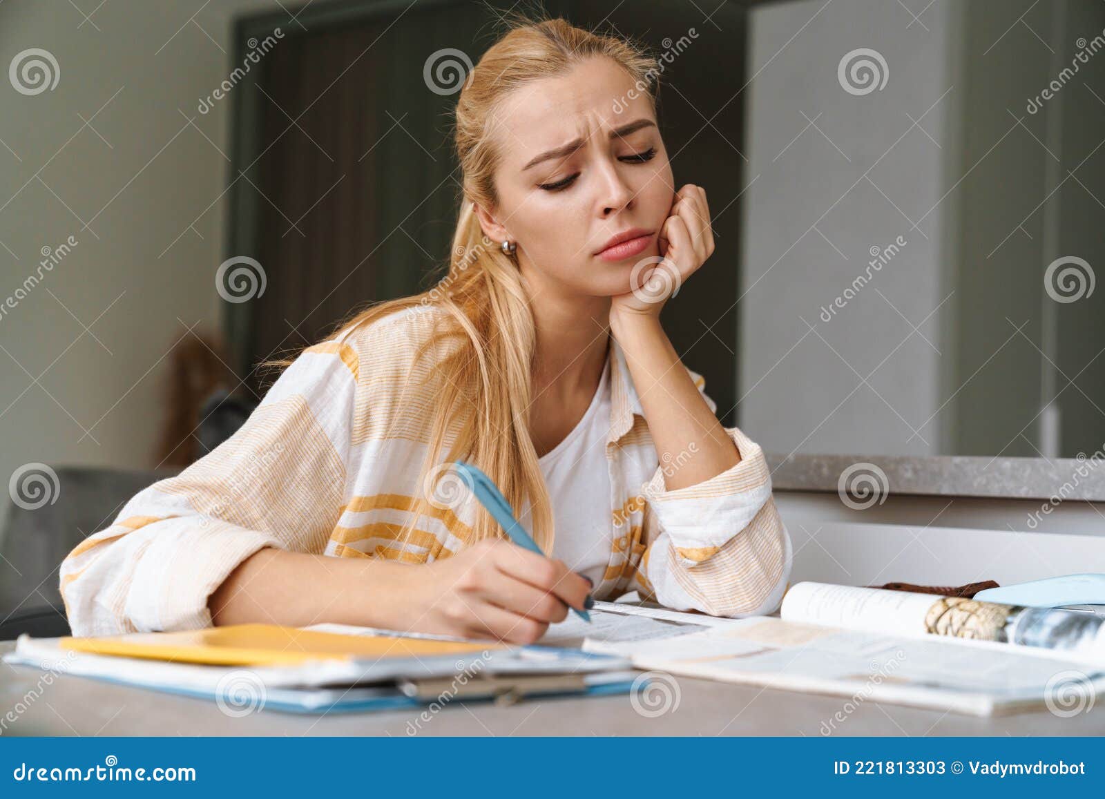 Bored Young Girl Studying at the Table Stock Image - Image of ...