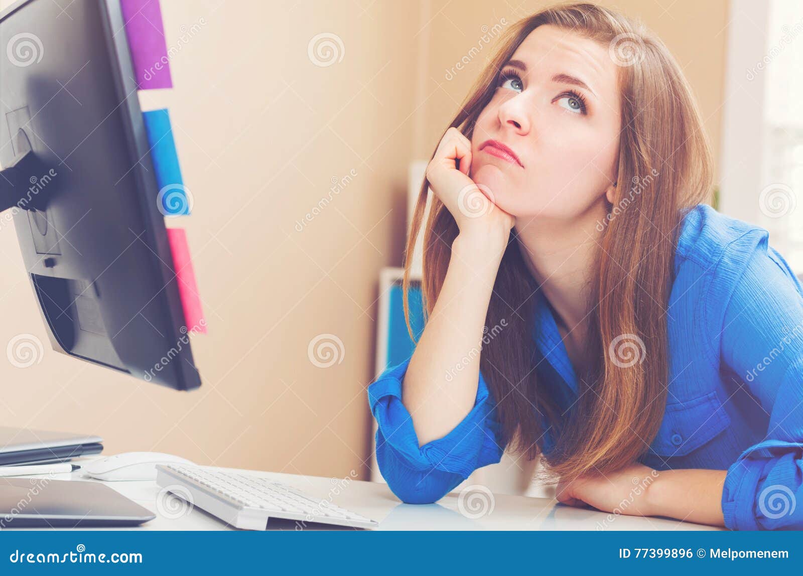 Bored Young Woman Sitting at Her Desk Stock Photo - Image of looking ...