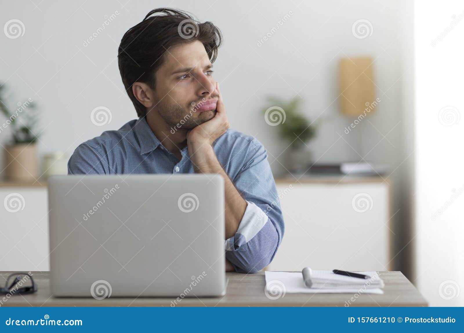 Bored Guy Sitting at Laptop Computer in Office Stock Photo - Image of ...