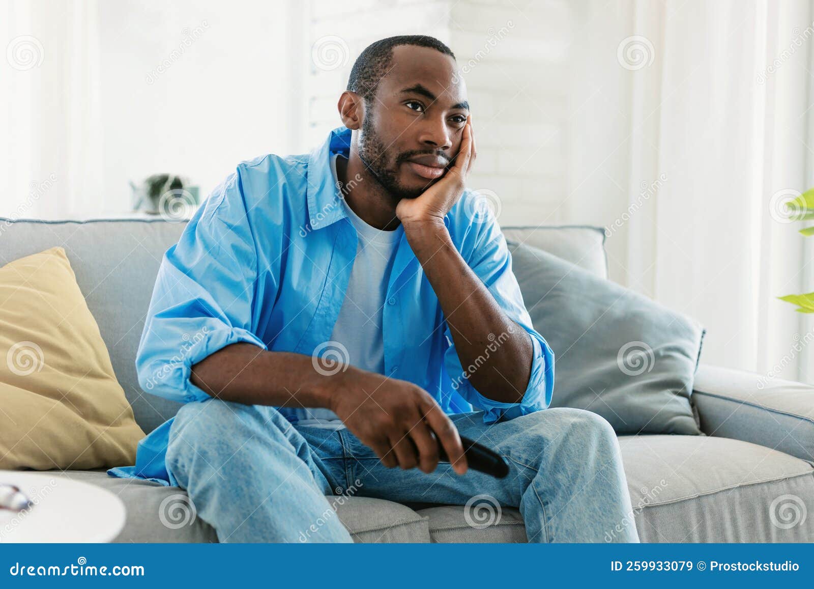 Boring Television Program. Discontented Black Guy Watching TV ...