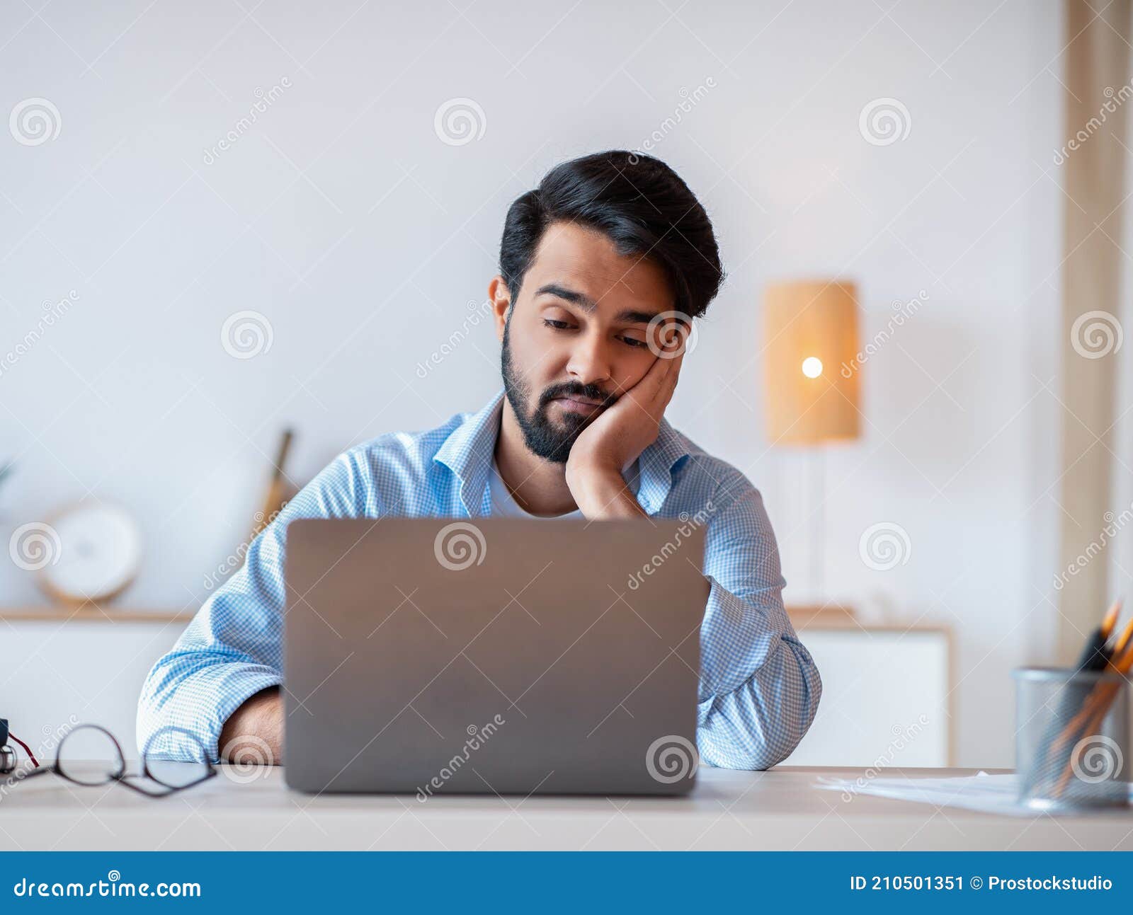 Boring Work. Arab Freelancer Guy Working on Laptop with Bored Face ...