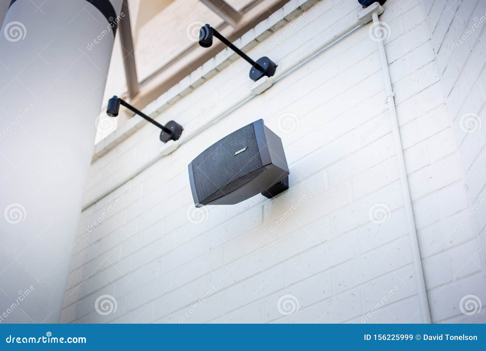 Bose speaker on a wall editorial stock image. Image of attached - 156225999