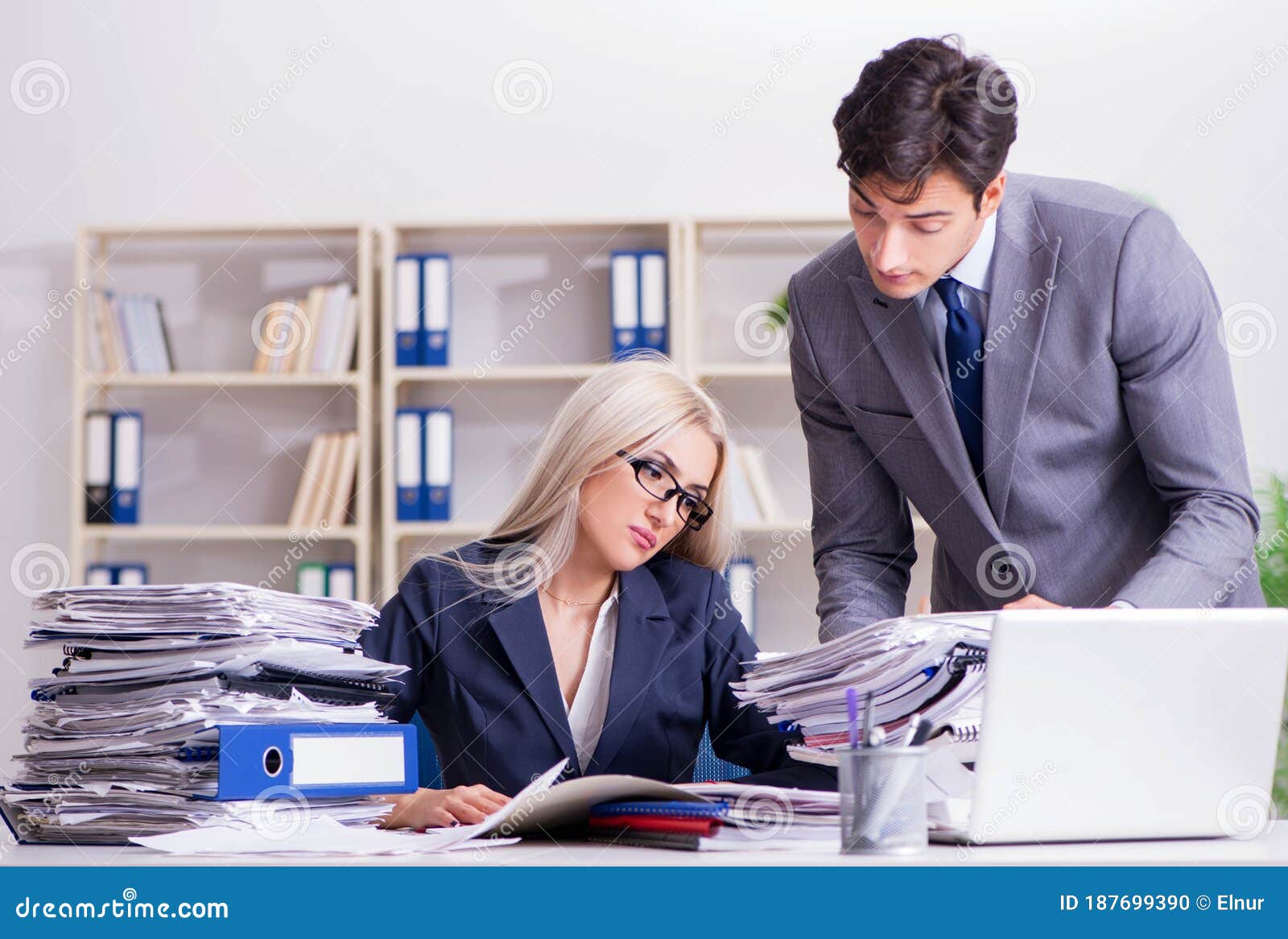 Boss Bringing Additional Work To His Assistant Secretary Stock Photo ...