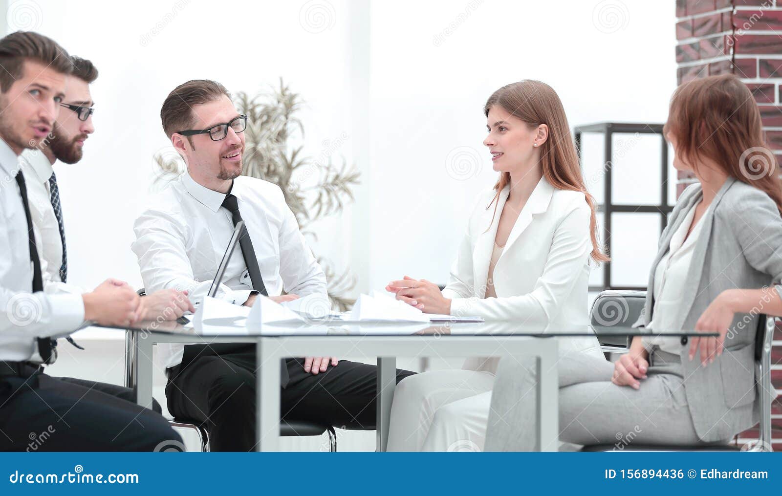 Boss and Business Team Sitting at the Desk. Stock Photo - Image of ...
