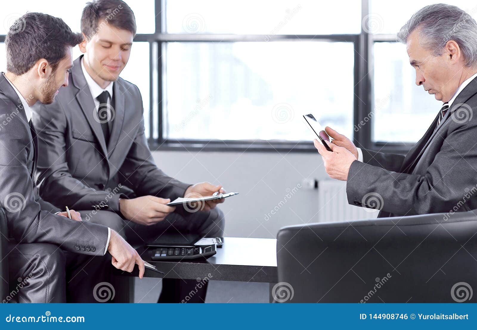 Boss with a Clipboard , Sitting in an Office. Photo with Copy Space ...