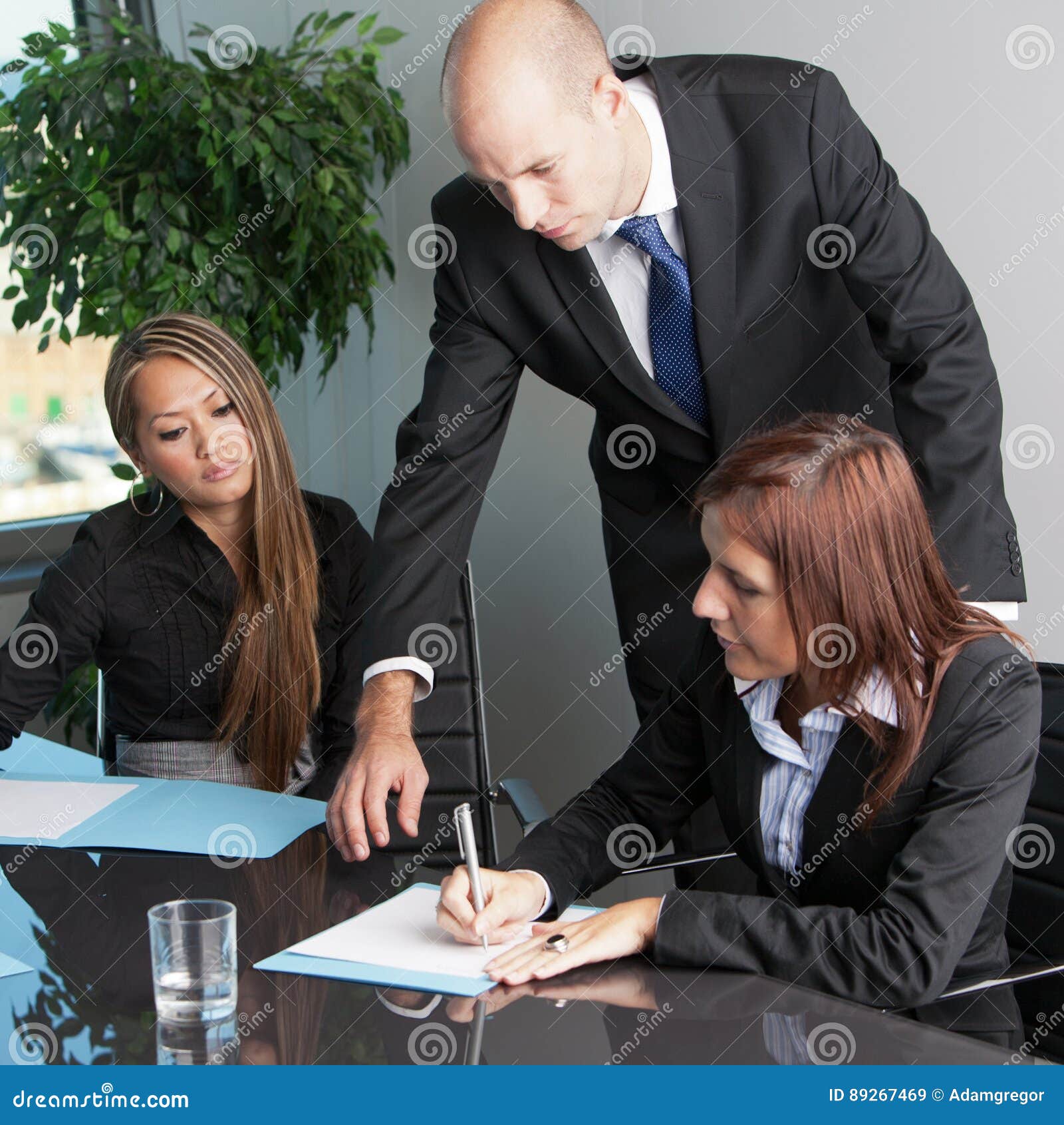Boss helping his team stock image. Image of businesswoman - 89267469