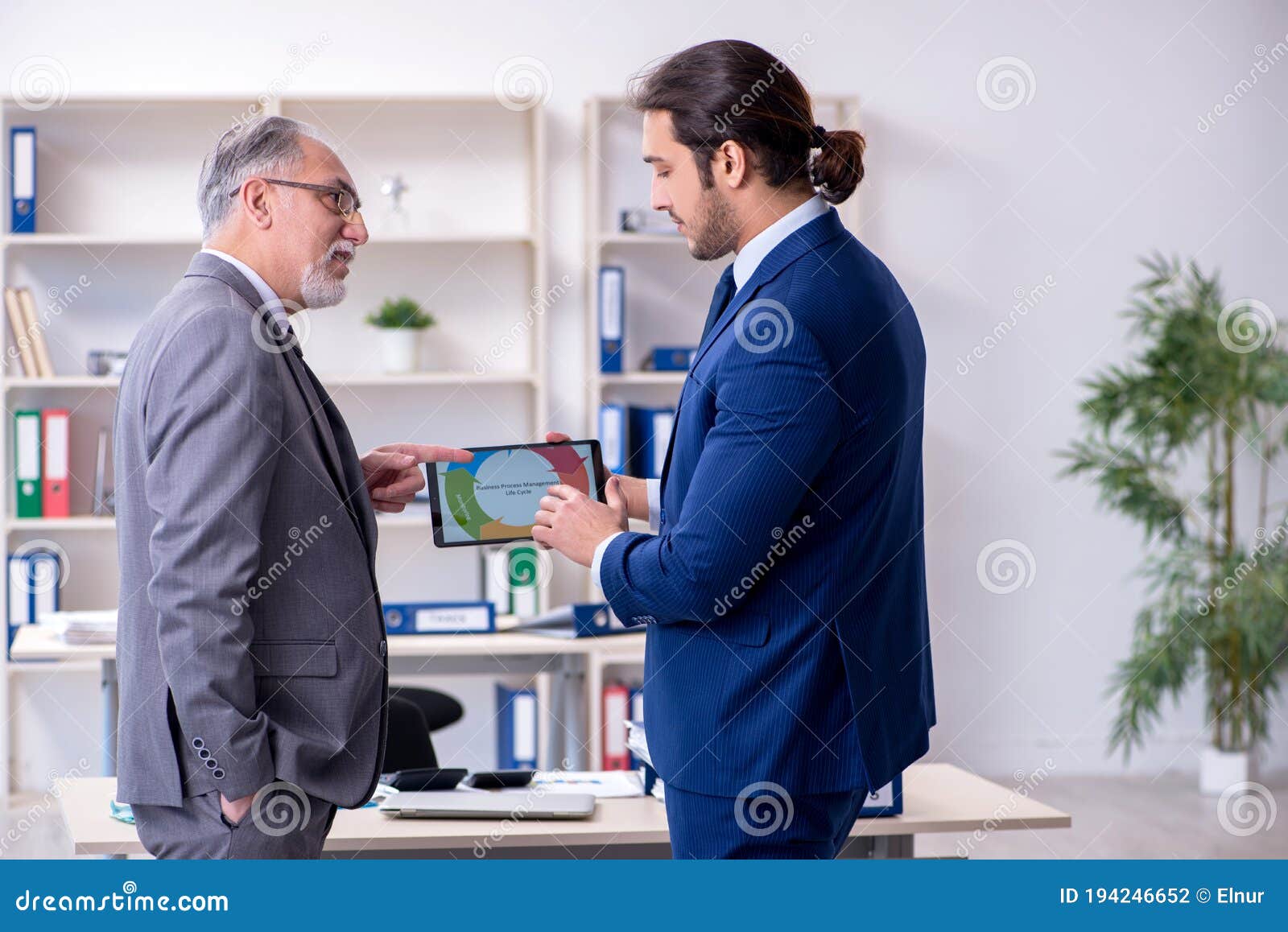 Boss and His Assistant Discussing Company Results Stock Photo - Image ...