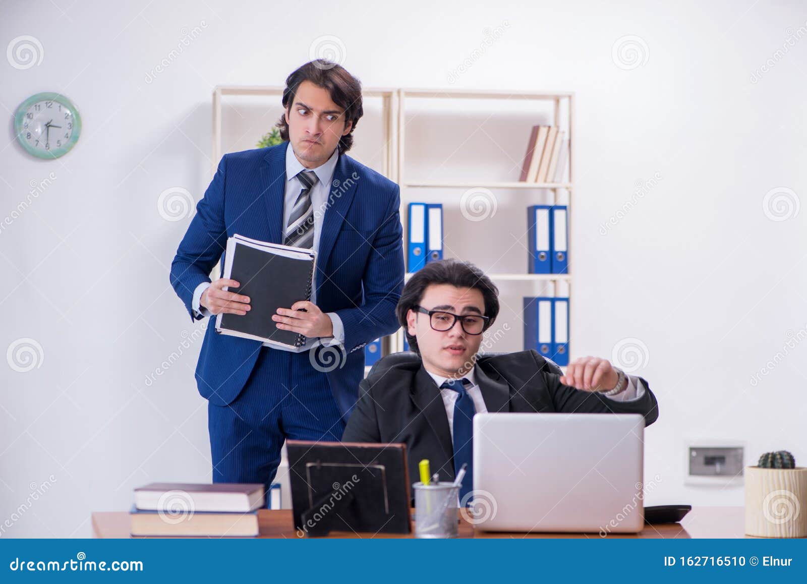 Boss and His Male Assistant Working in the Office Stock Photo - Image ...