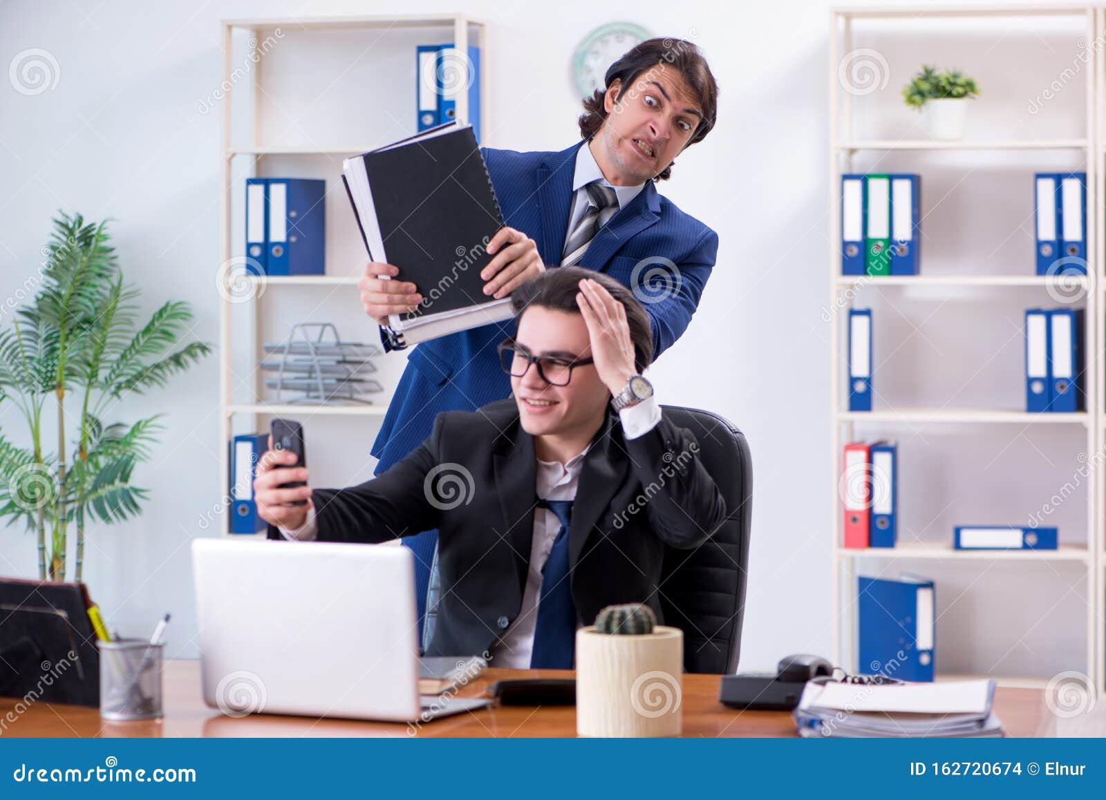 Boss and His Male Assistant Working in the Office Stock Photo - Image ...