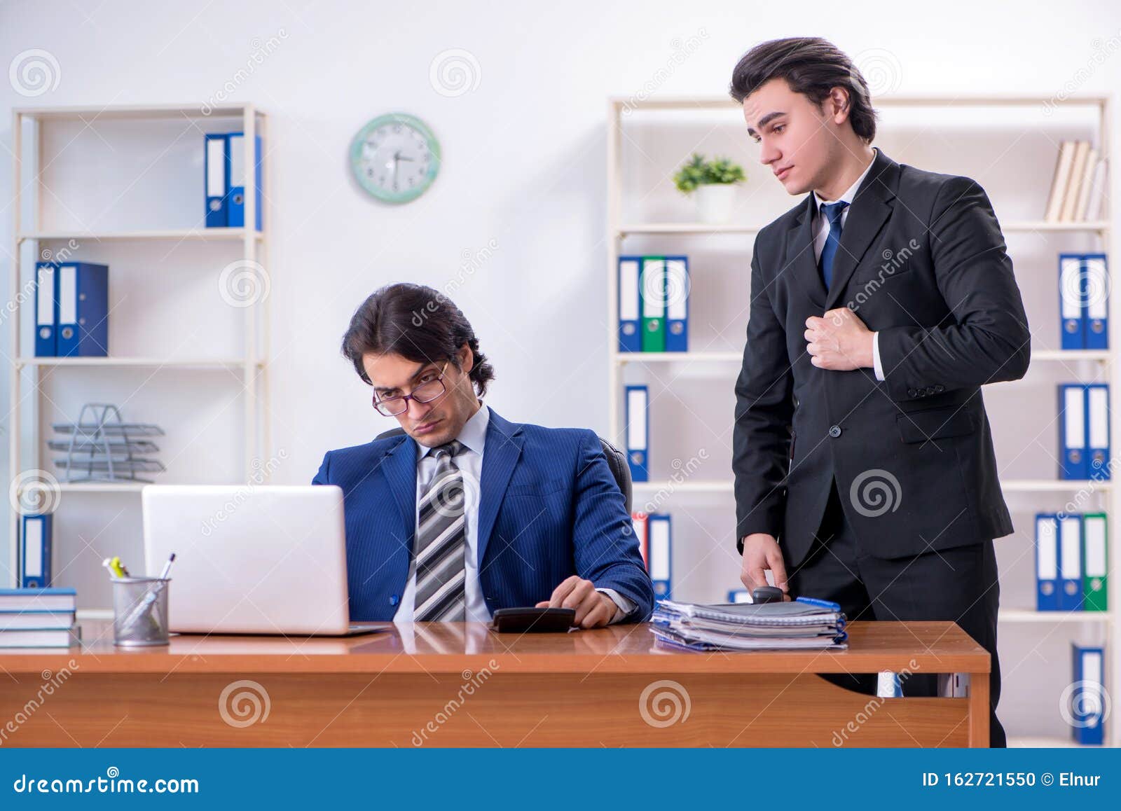 Boss and His Male Assistant Working in the Office Stock Photo - Image ...
