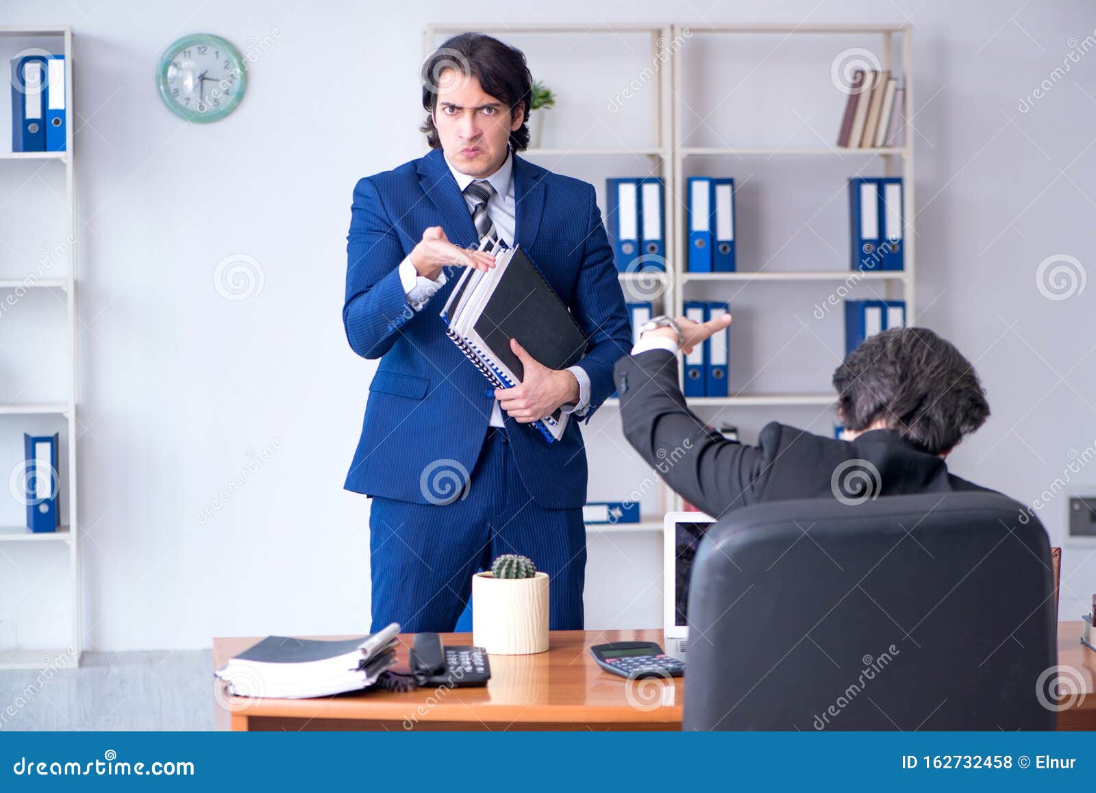 Boss and His Male Assistant Working in the Office Stock Photo - Image ...