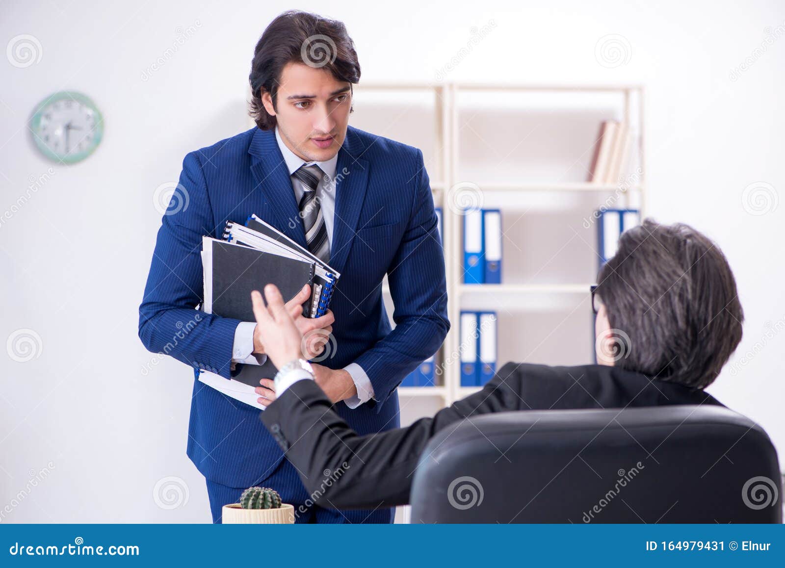 Boss and His Male Assistant Working in the Office Stock Image - Image ...