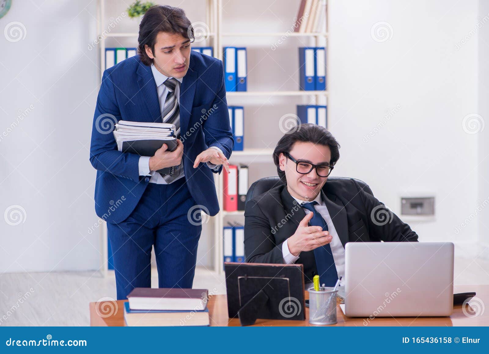 Boss and His Male Assistant Working in the Office Stock Photo - Image ...