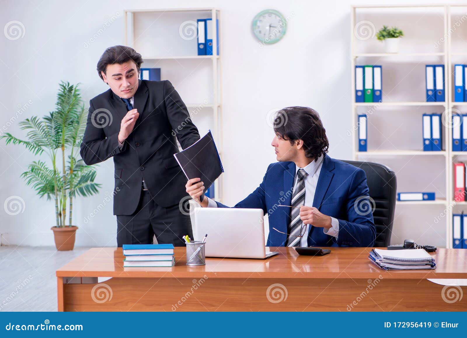Boss and His Male Assistant Working in the Office Stock Image - Image ...