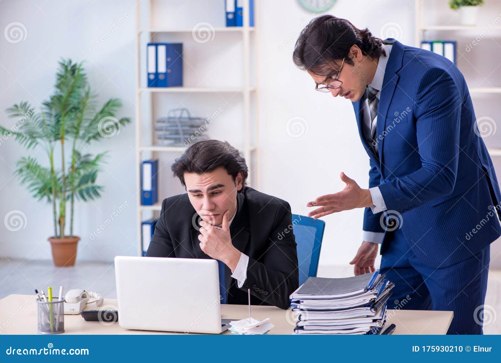 Boss and His Male Assistant Working in the Office Stock Photo - Image ...