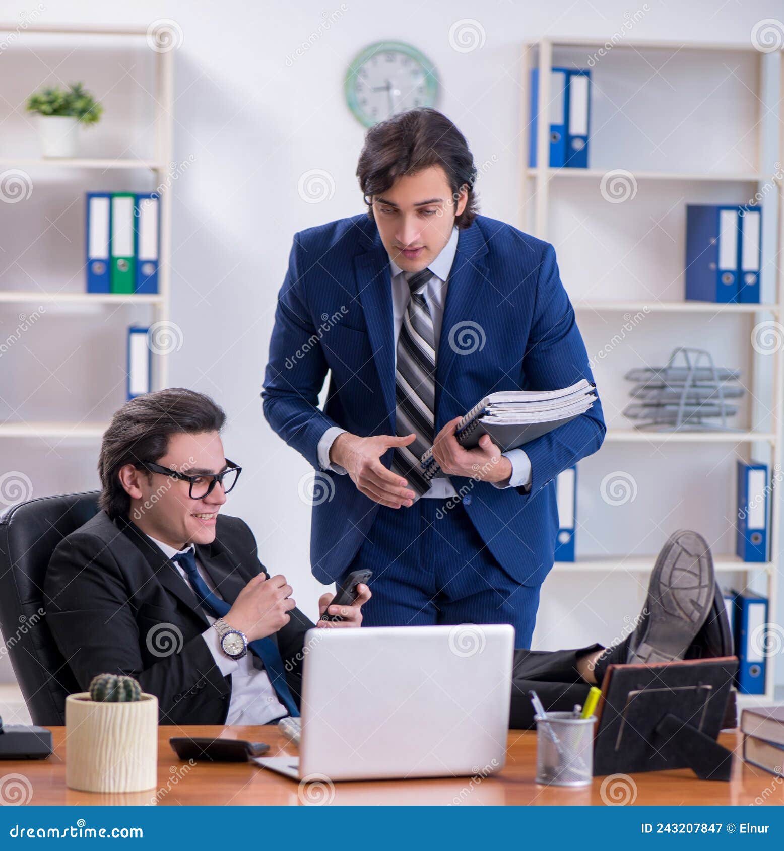 Boss and His Male Assistant Working in the Office Stock Image - Image ...