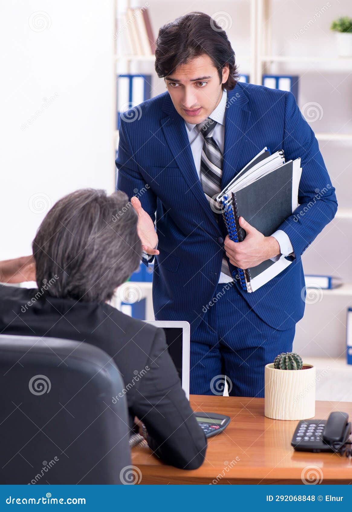 Boss and His Male Assistant Working in the Office Stock Photo - Image ...