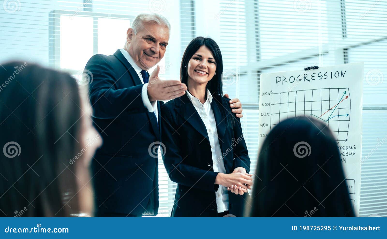 Boss Introducing a Young Employee during a Meeting Stock Image - Image ...