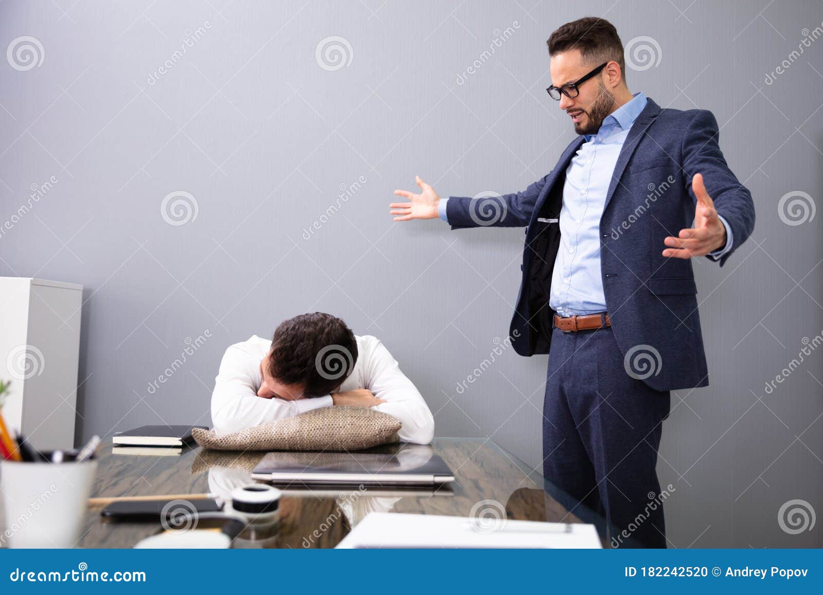 Boss Looking at Tired Employee Sleeping at Office Stock Photo - Image ...
