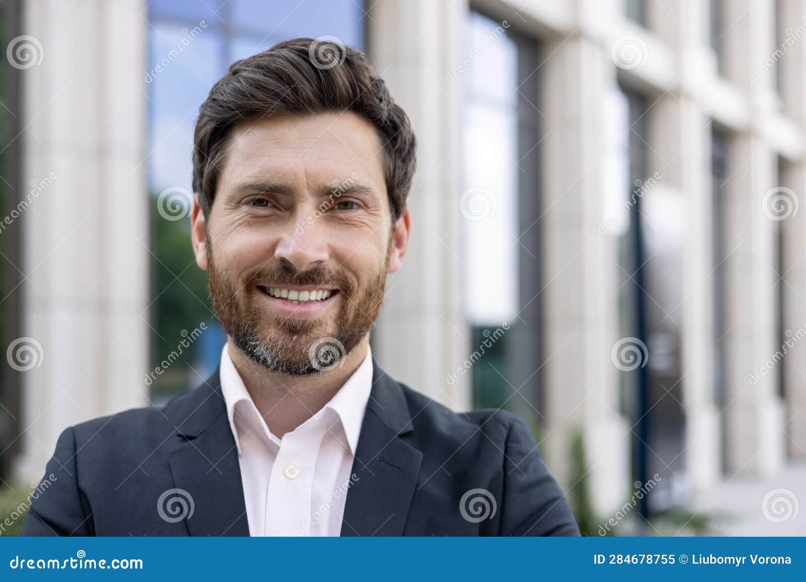 Boss Man Looking at Camera and Smiling, Young Businessman Banker with ... Boss Man Looking at Camera and Smiling, Young Businessman Banker with ...