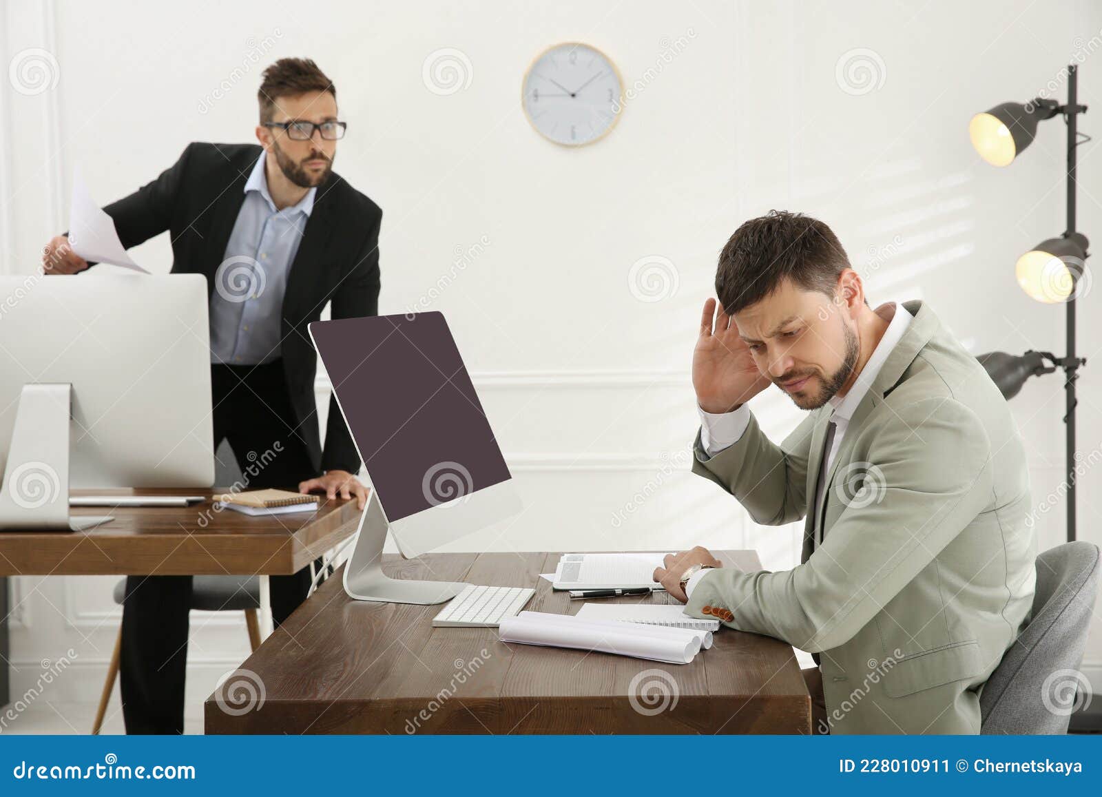 Boss Scolding Employee in Office. Toxic Work Environment Stock Image ...