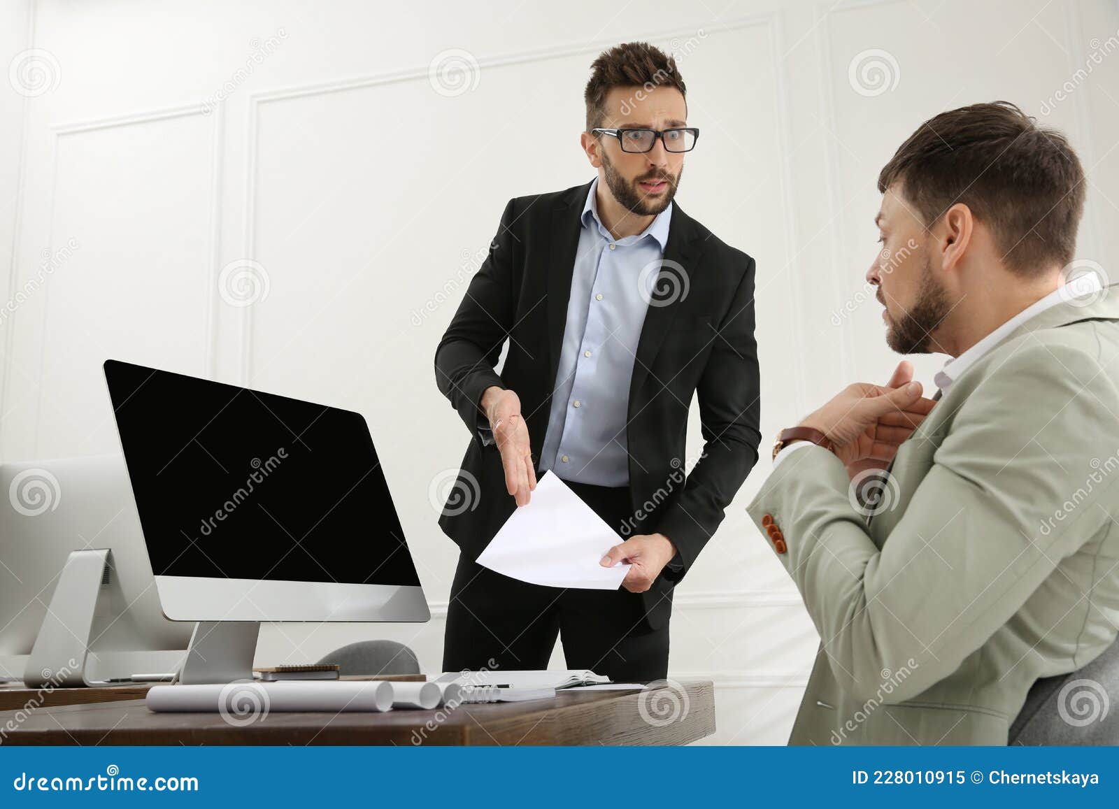 Boss Scolding Employee in Office. Toxic Work Environment Stock Image ...