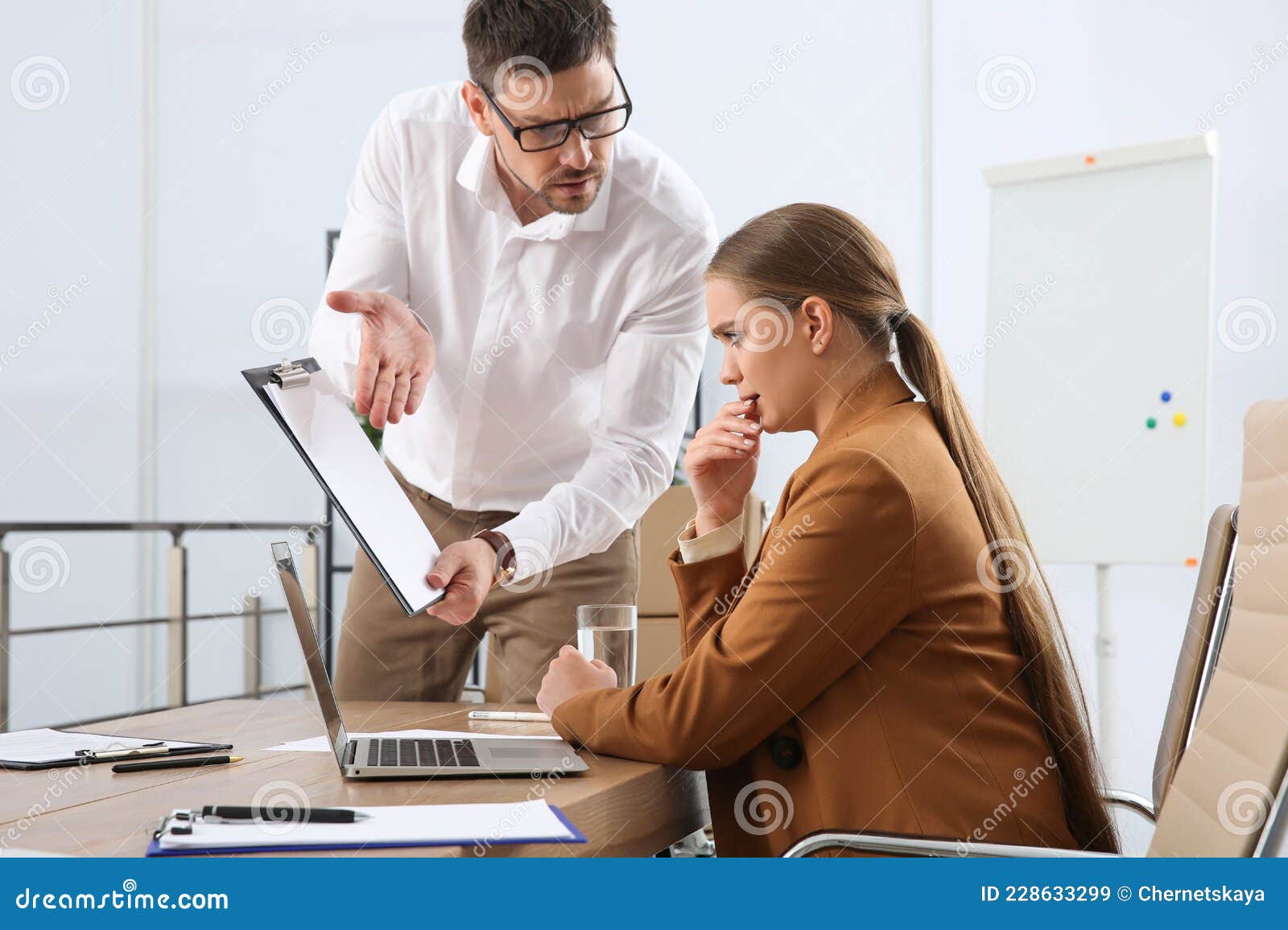 Boss Scolding Employee in Office. Toxic Work Environment Stock Image ...