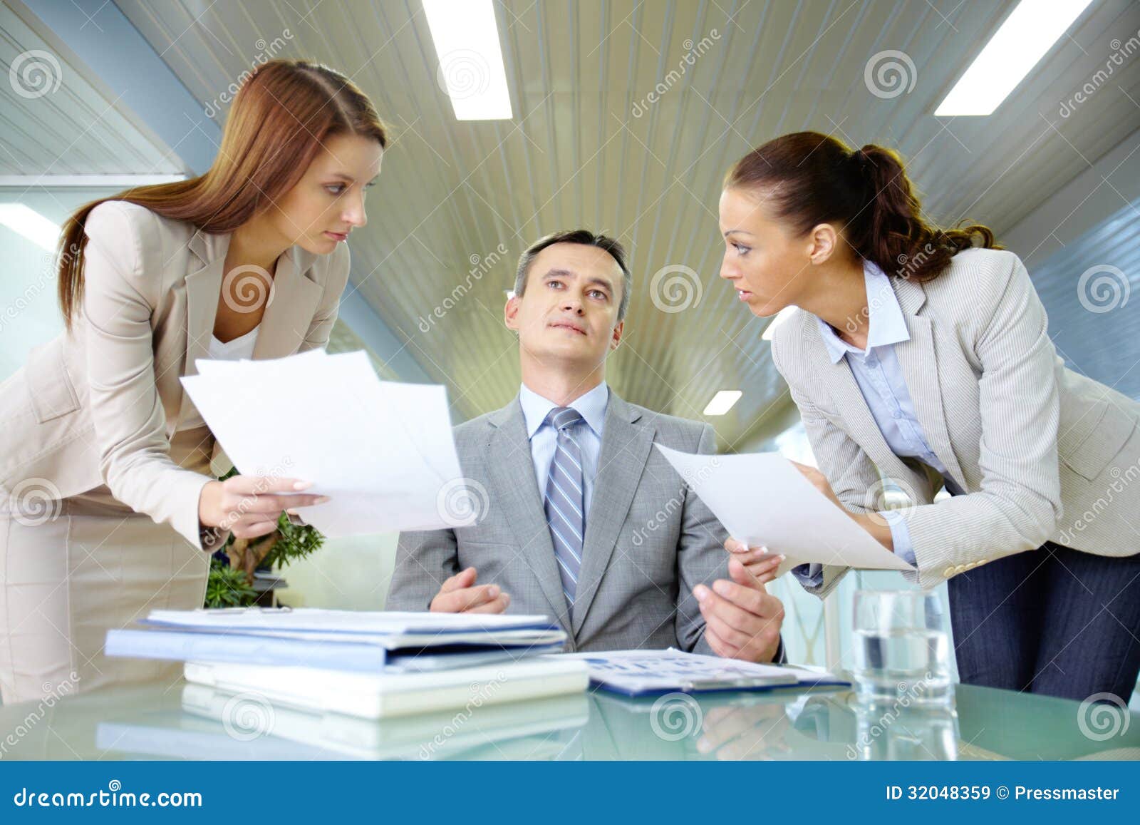 Boss and secretaries stock image. Image of employee, paper - 32048359
