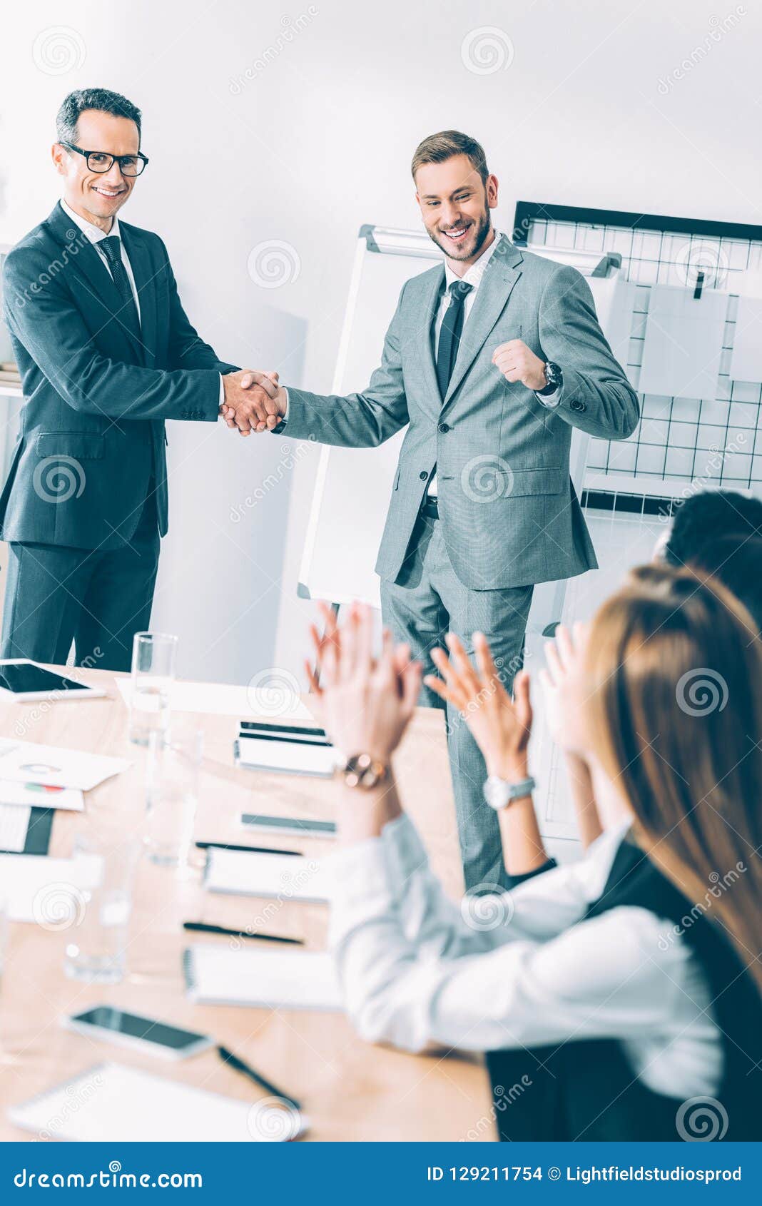 Boss Shaking Hand of Manager while Colleagues Clapping Stock Photo ...