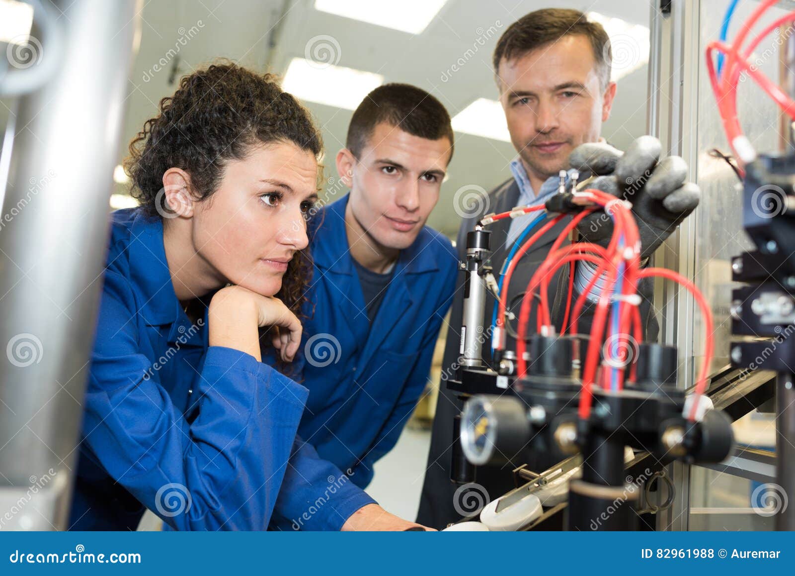 Boss Showing Workers New Machine Stock Photo - Image of light, factory ...