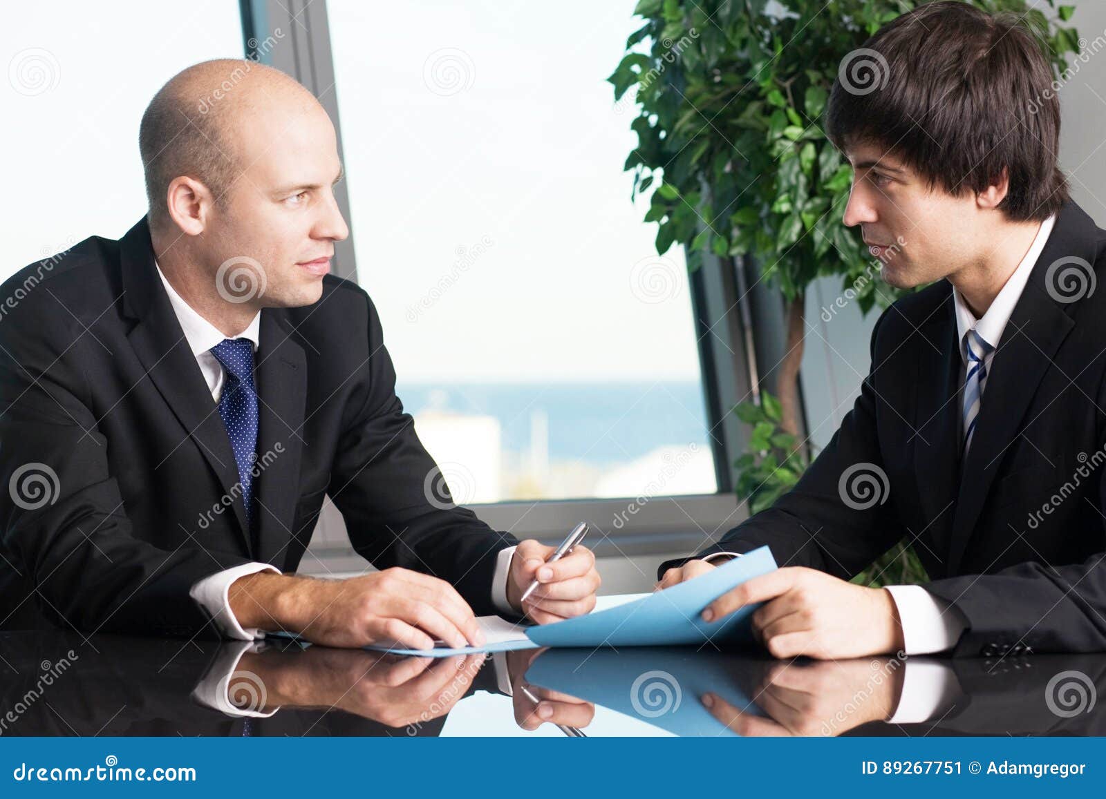 Boss signing documents stock image. Image of signing - 89267751