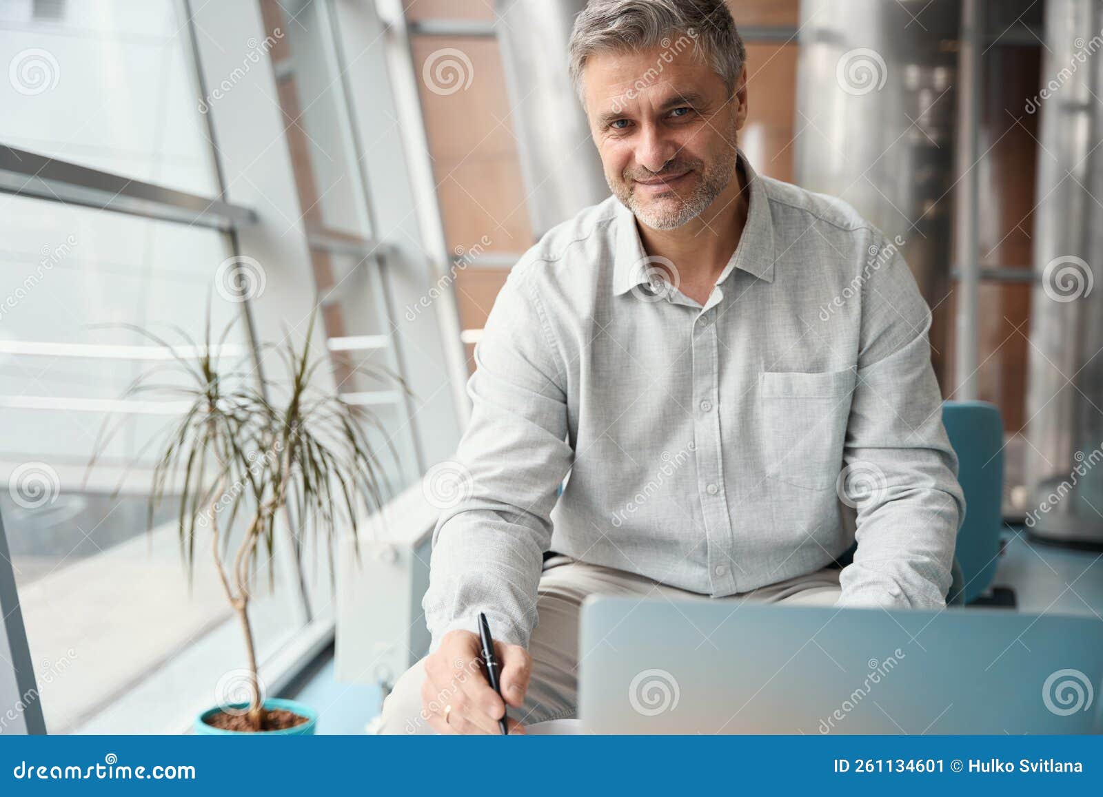 Boss Signs Work Papers in a Coworking Space among Plants Stock Image ...