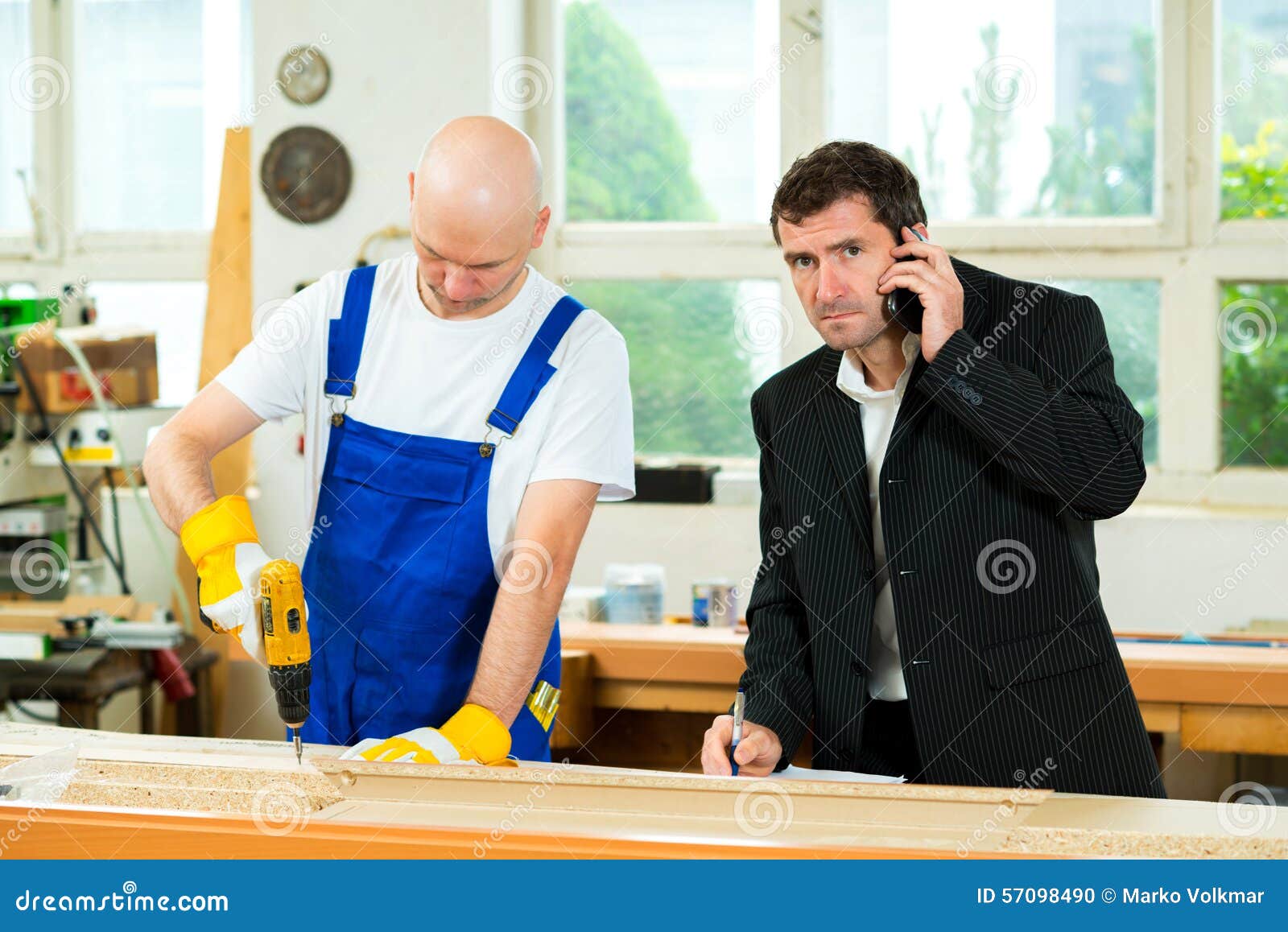 Boss and Worker in a Carpenter S Workshop Stock Photo - Image of ...