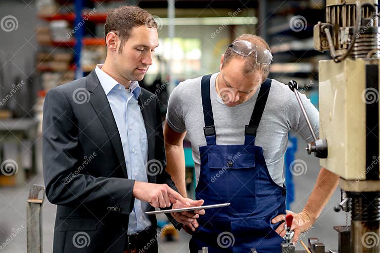 Boss and Worker in Conversation Stock Photo - Image of industry ...