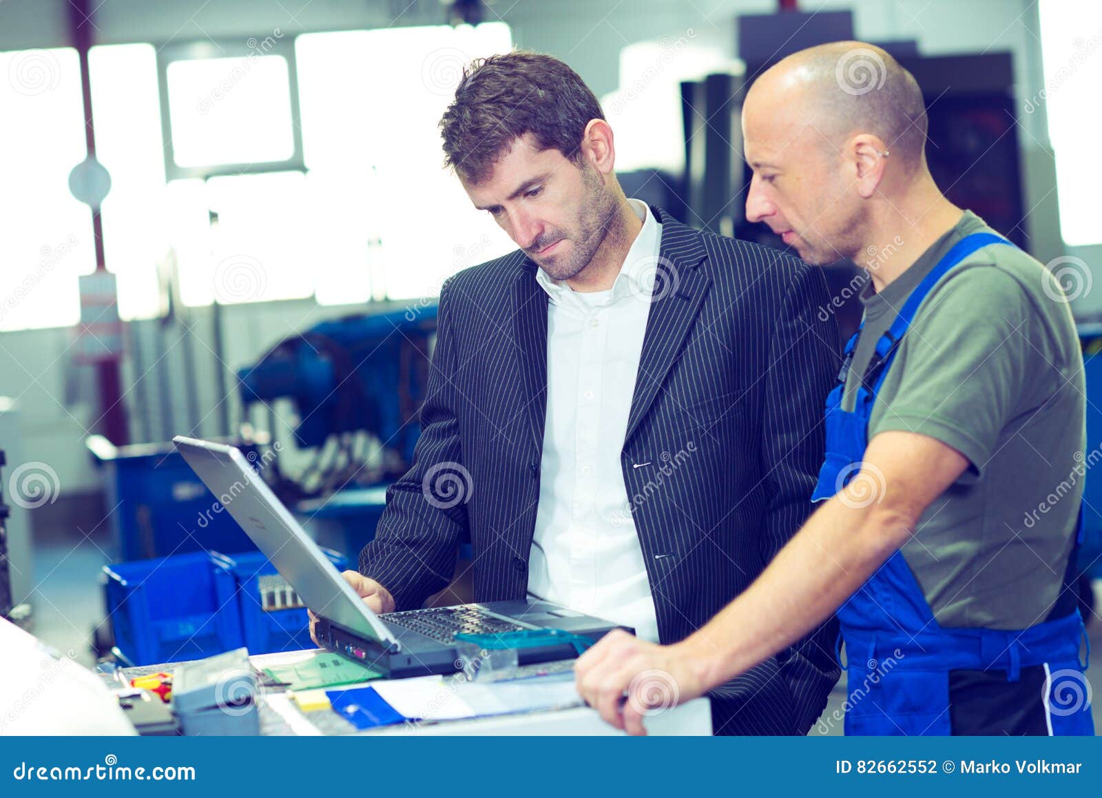 Boss and Worker on Work Bench Stock Photo - Image of management ...