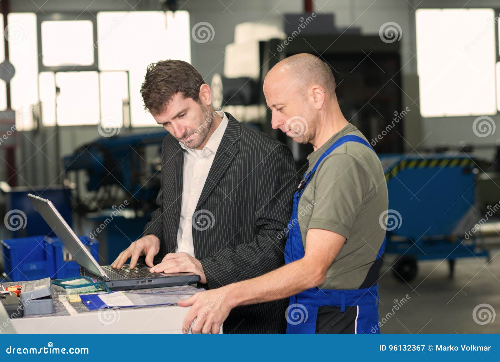 Boss and Worker on Work Bench Stock Image - Image of meeting, direction ...